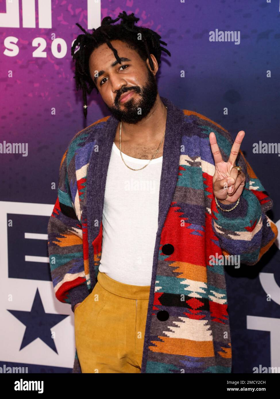 Recording artist Deon Jones attends 2021 Soul Train Awards red carpet ...