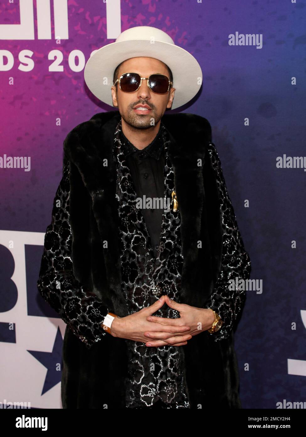 DJ Cassidy attends 2021 Soul Train Awards red carpet at Adam Clayton ...
