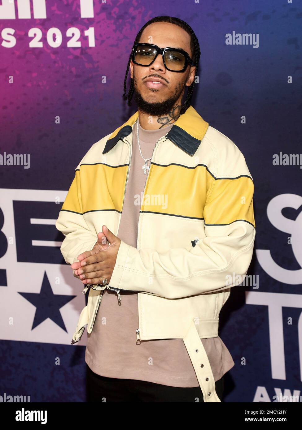 Recording artist Elhae attends 2021 Soul Train Awards red carpet at ...