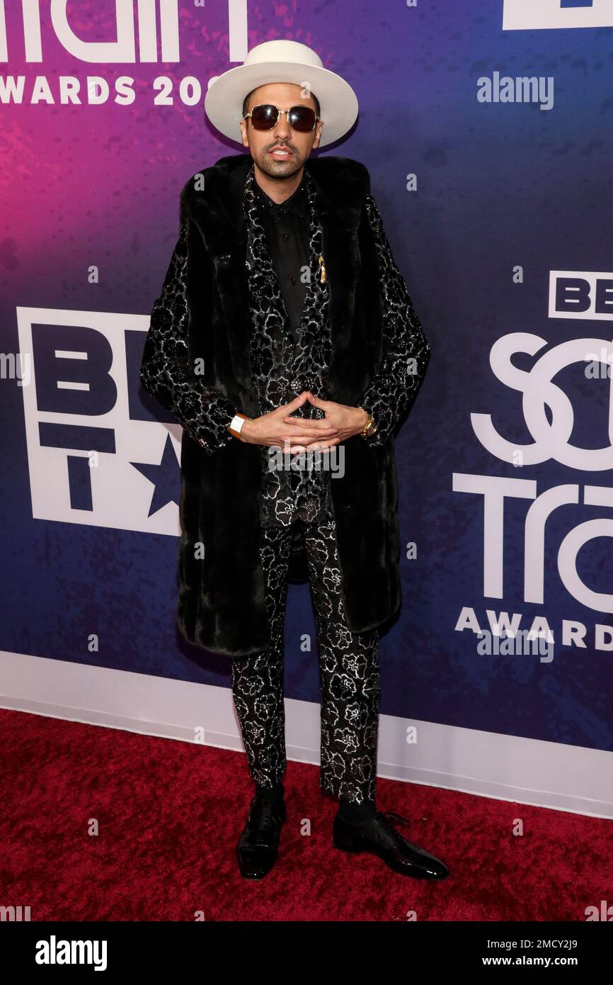 DJ Cassidy attends 2021 Soul Train Awards red carpet at Adam Clayton ...
