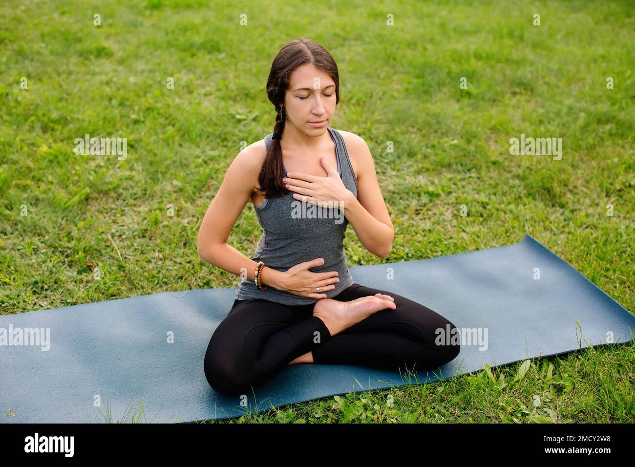 Half lotus posture hi-res stock photography and images - Alamy