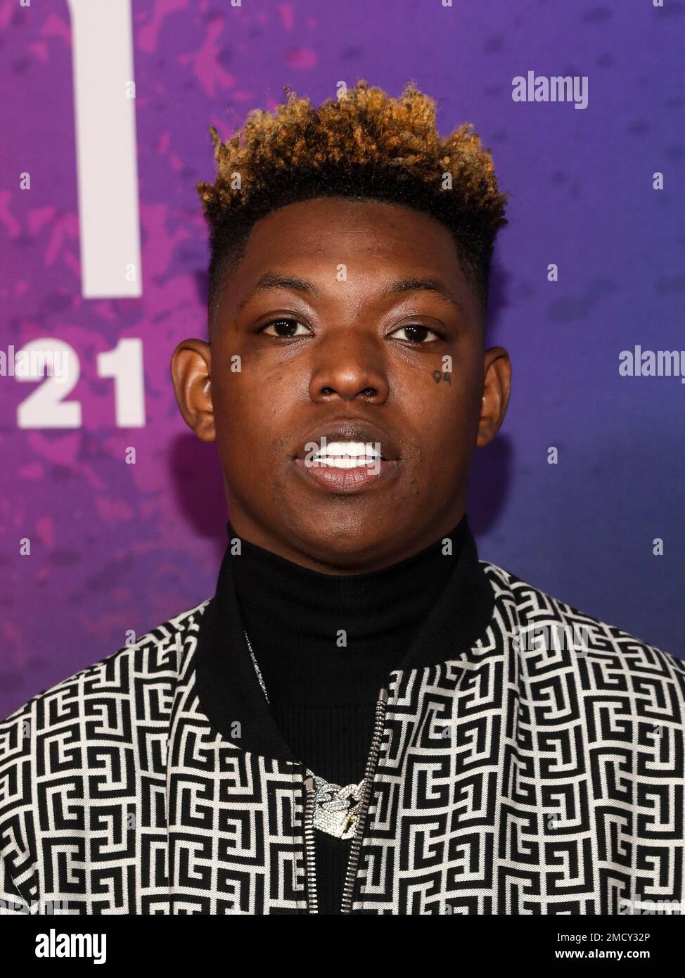 Recording artist Yung Bleu attends 2021 Soul Train Awards red carpet at ...