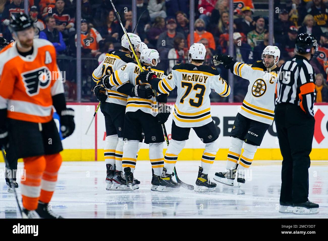 Boston Bruins' players celebrate after a goal by Derek Forbort during ...