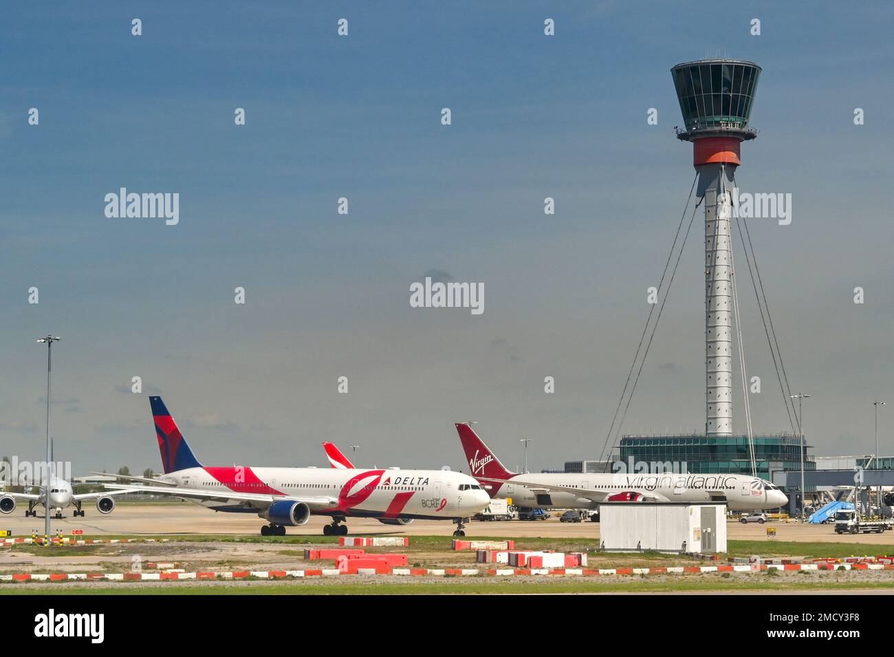 London, England - April 2022: Boeing 777 of Delta Air Lines and a ...