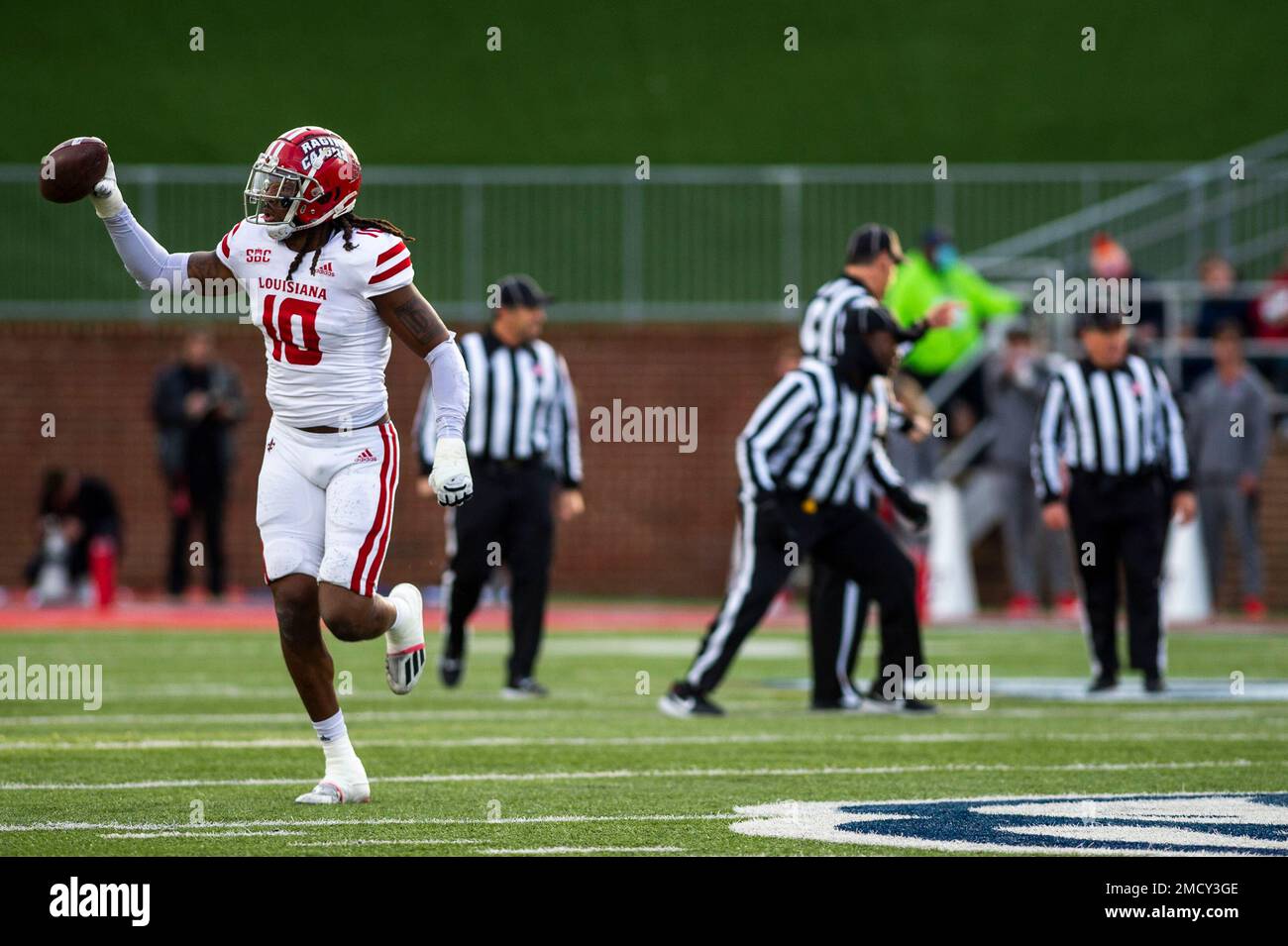 Louisiana-Lafayette defensive lineman Andre Jones (10) holds the ball ...