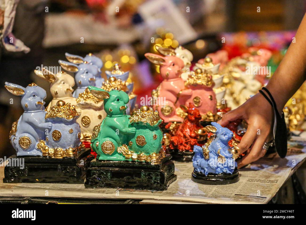 Manila, Philippines. 21st Jan, 2023. A customer buys lucky charm ...