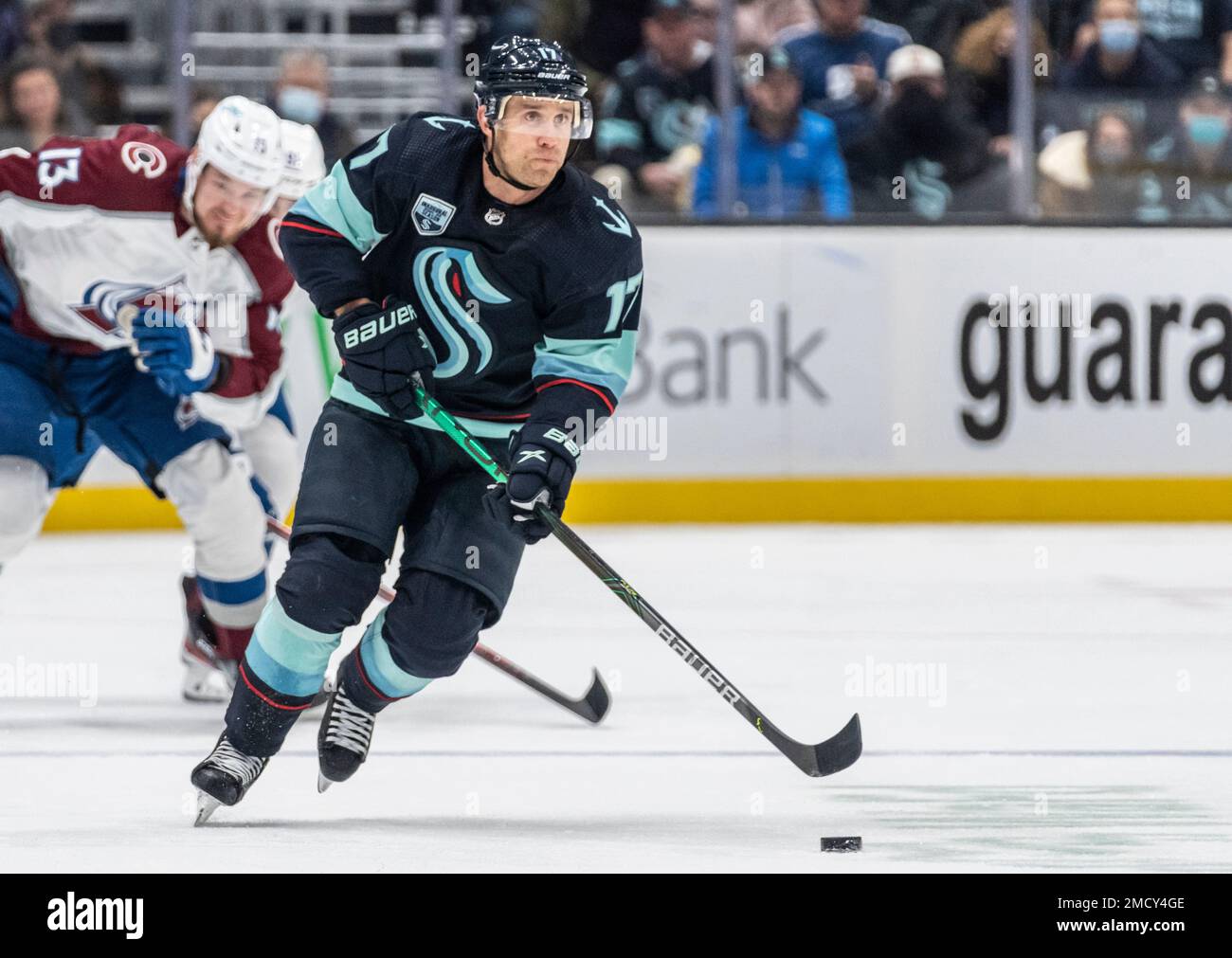 Seattle Kraken center Jaden Schwartz skates with the puck during an NHL ...