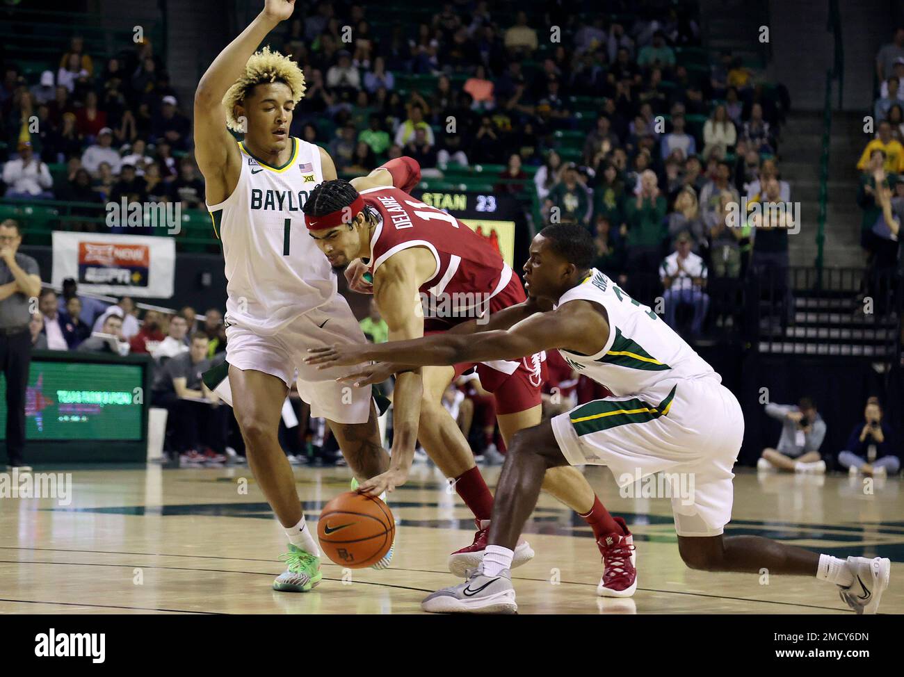 Stanford forward Jaiden Delaire, center Baylor guard Dale Bonner, right ...