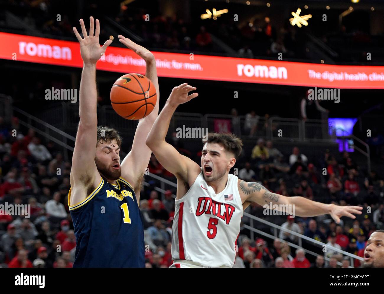 UNLV guard Jordan McCabe (5) loses the ball as he shoots against ...