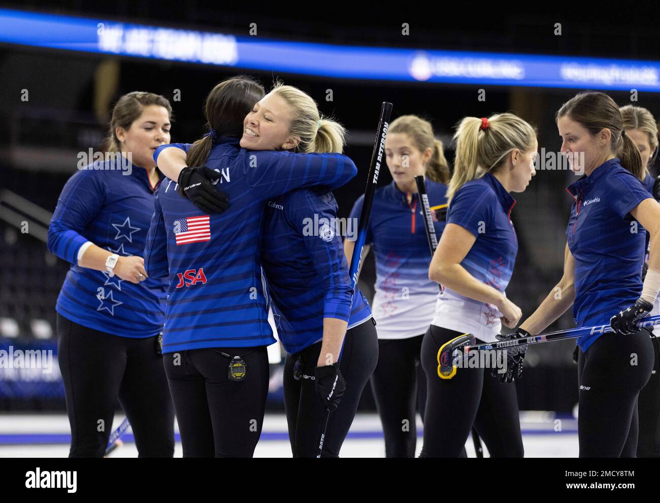 Team Peterson's Tabitha Peterson, front left, hugs Nina Roth alongside ...