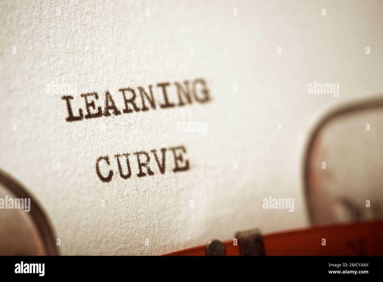 Learning curve phrase written with a typewriter Stock Photo - Alamy