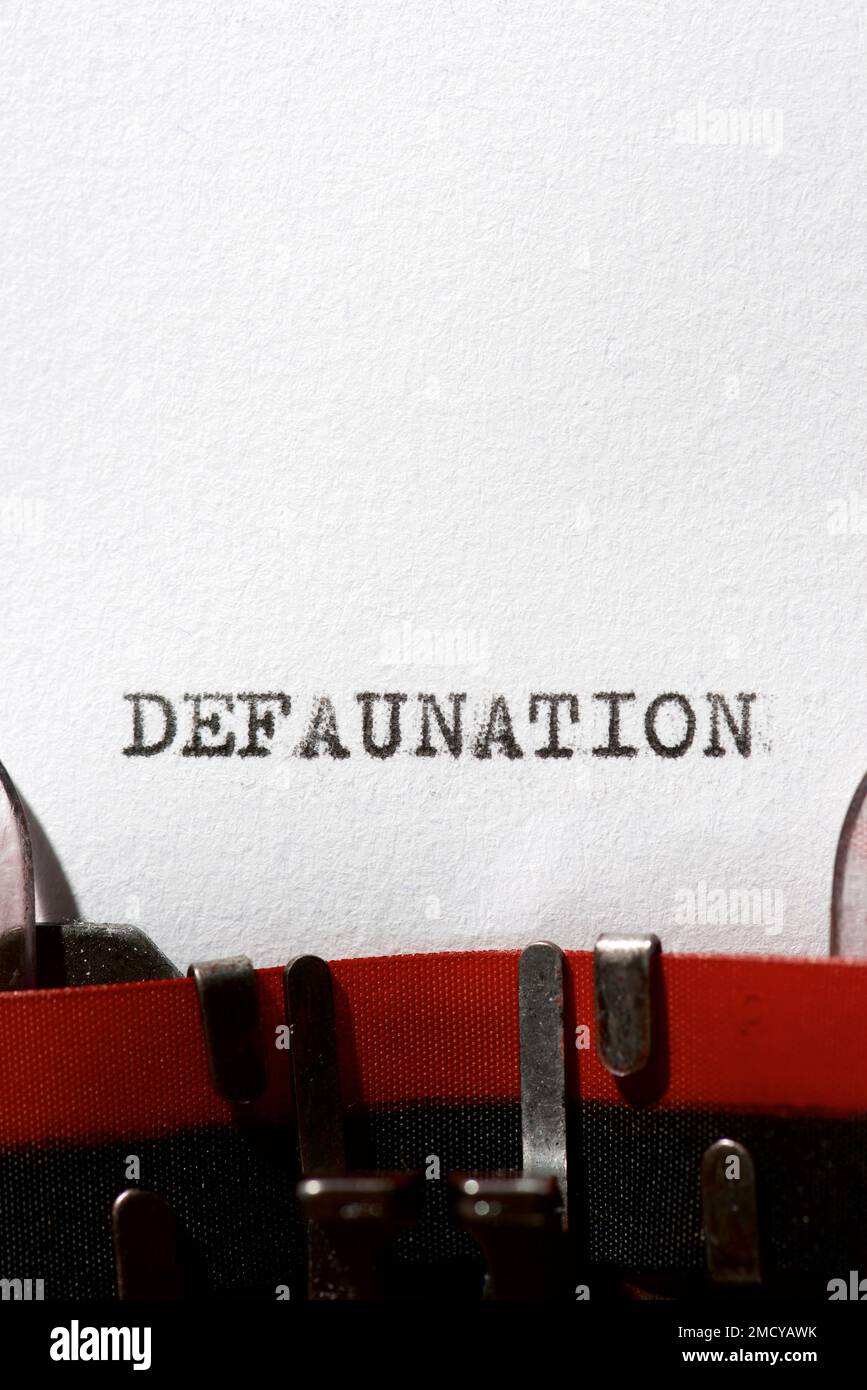 Defaunation word written with a typewriter Stock Photo - Alamy