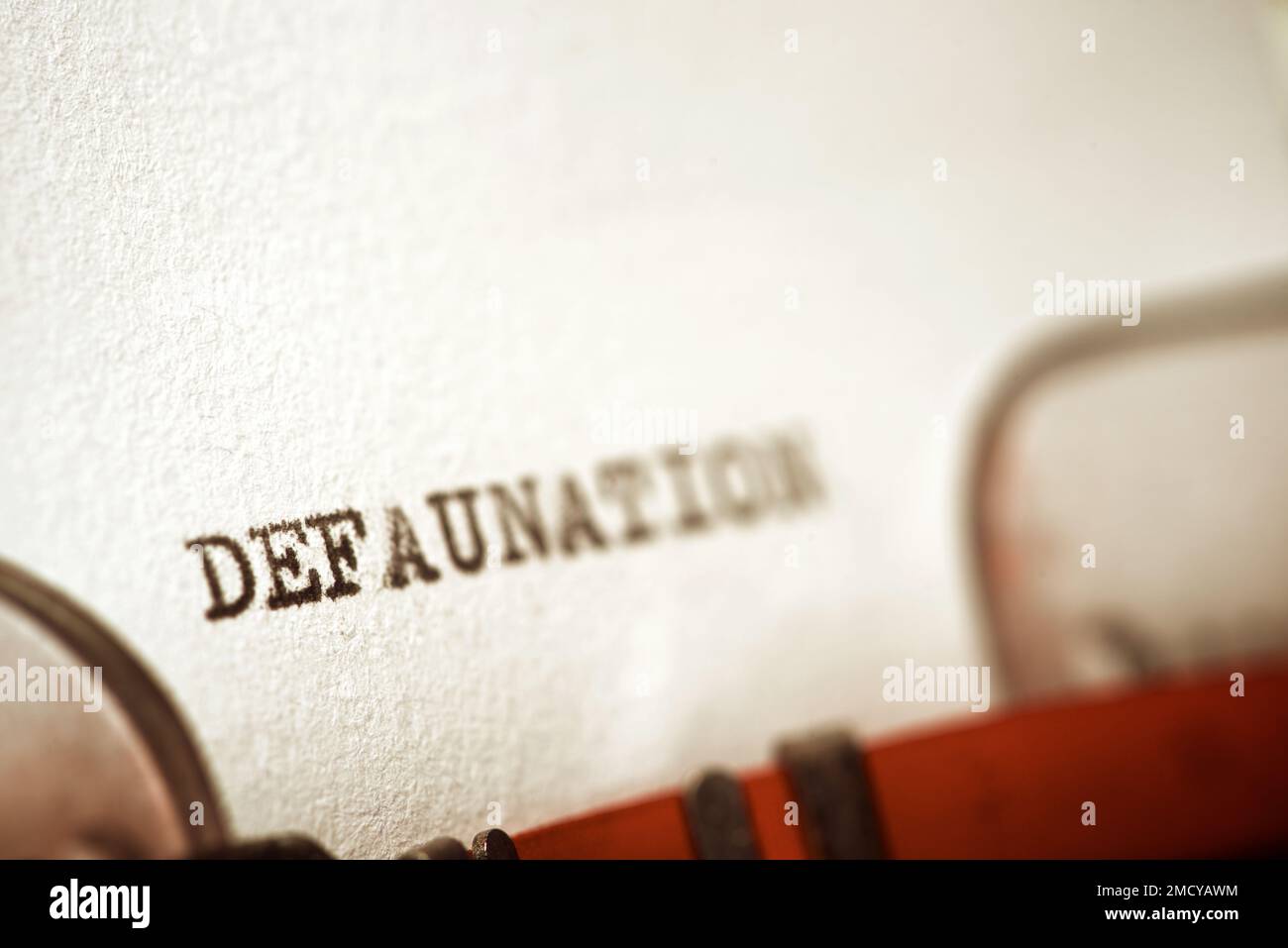 Defaunation word written with a typewriter Stock Photo - Alamy