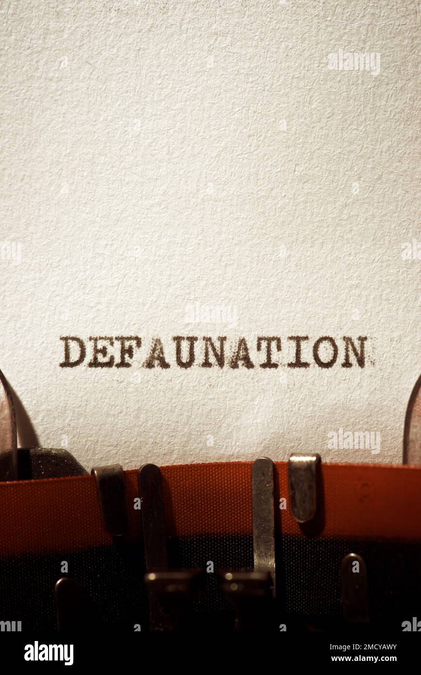 Defaunation word written with a typewriter Stock Photo - Alamy