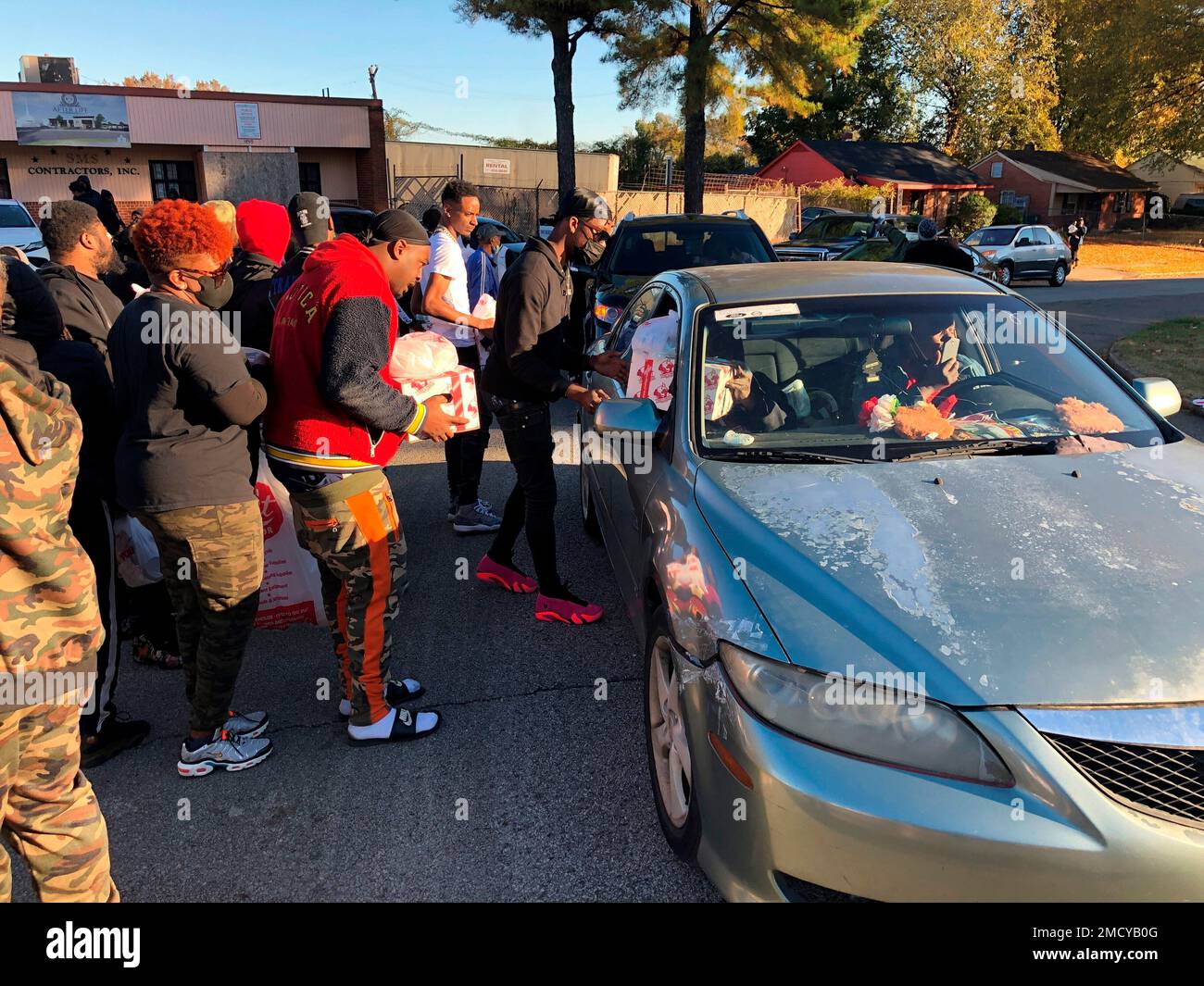 Friends of slain rapper Young Dolph distribute Thanksgiving turkeys ...