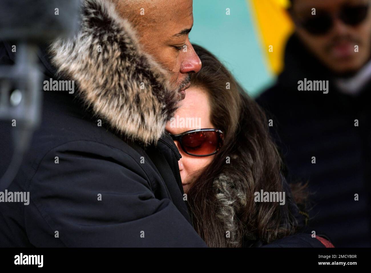 Bishop Tavis Grant consoles Kariann Swart, fiancée of Joseph Rosenbaum ...