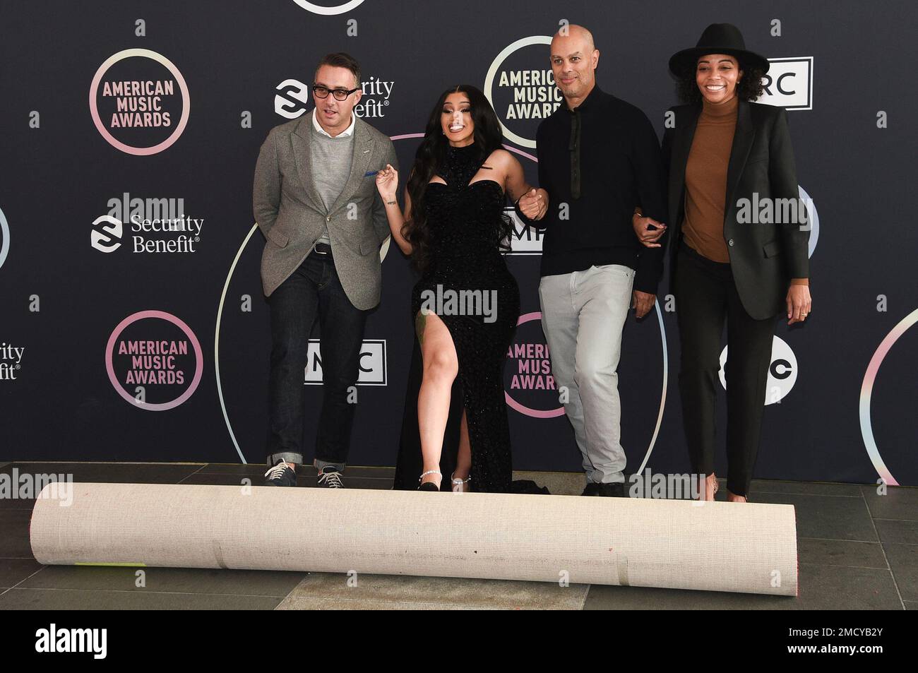 Adam Stotsky, from left, Cardi B, Jesse Collins and Dionne Harmon roll ...