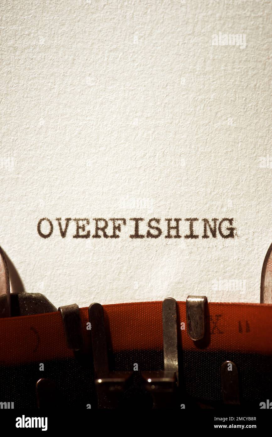 Overfishing word written with a typewriter Stock Photo - Alamy