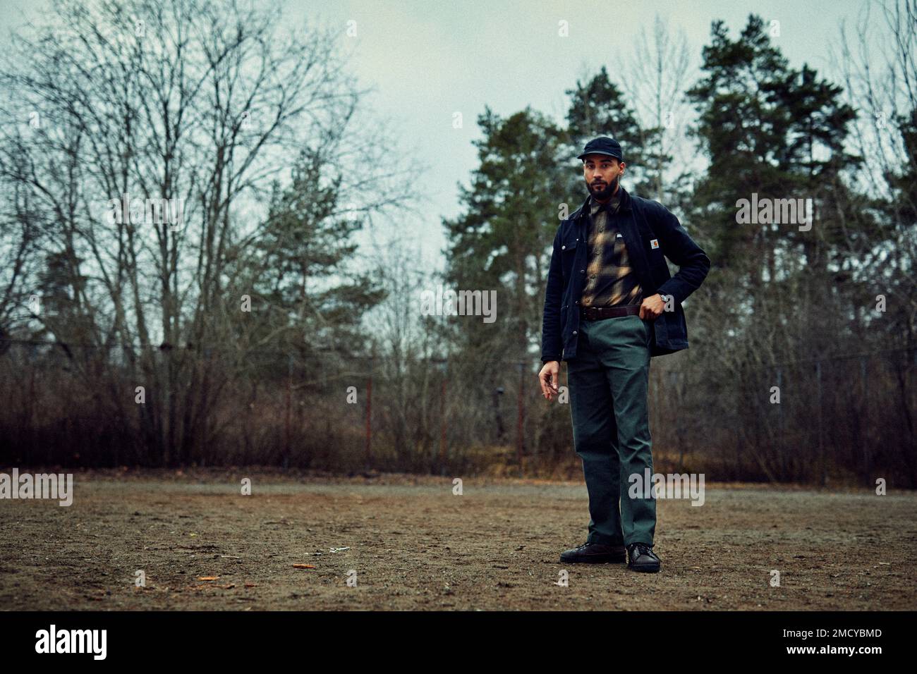 This striking photograph captures the essence of a Cholo, a term used ...