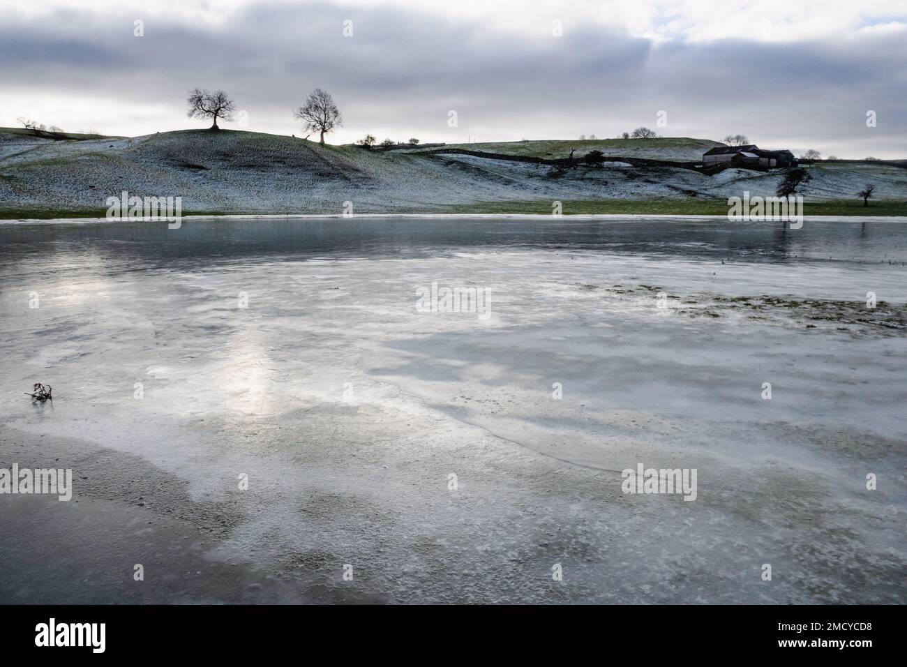 Ice on a flooded field in Wensleydale Stock Photo - Alamy