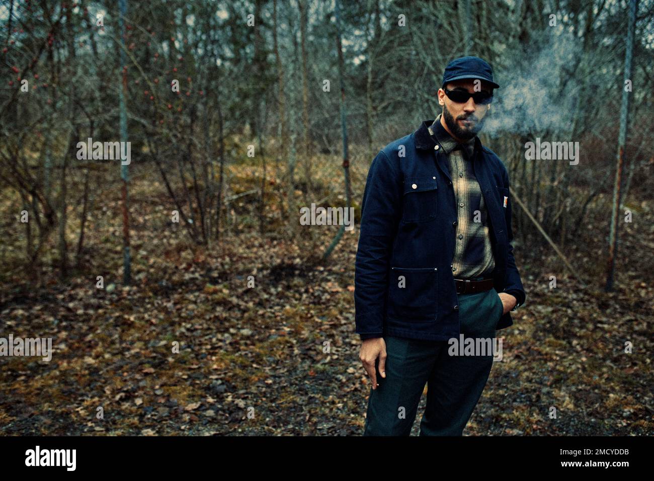 This striking photograph captures the essence of a Cholo, a term used ...