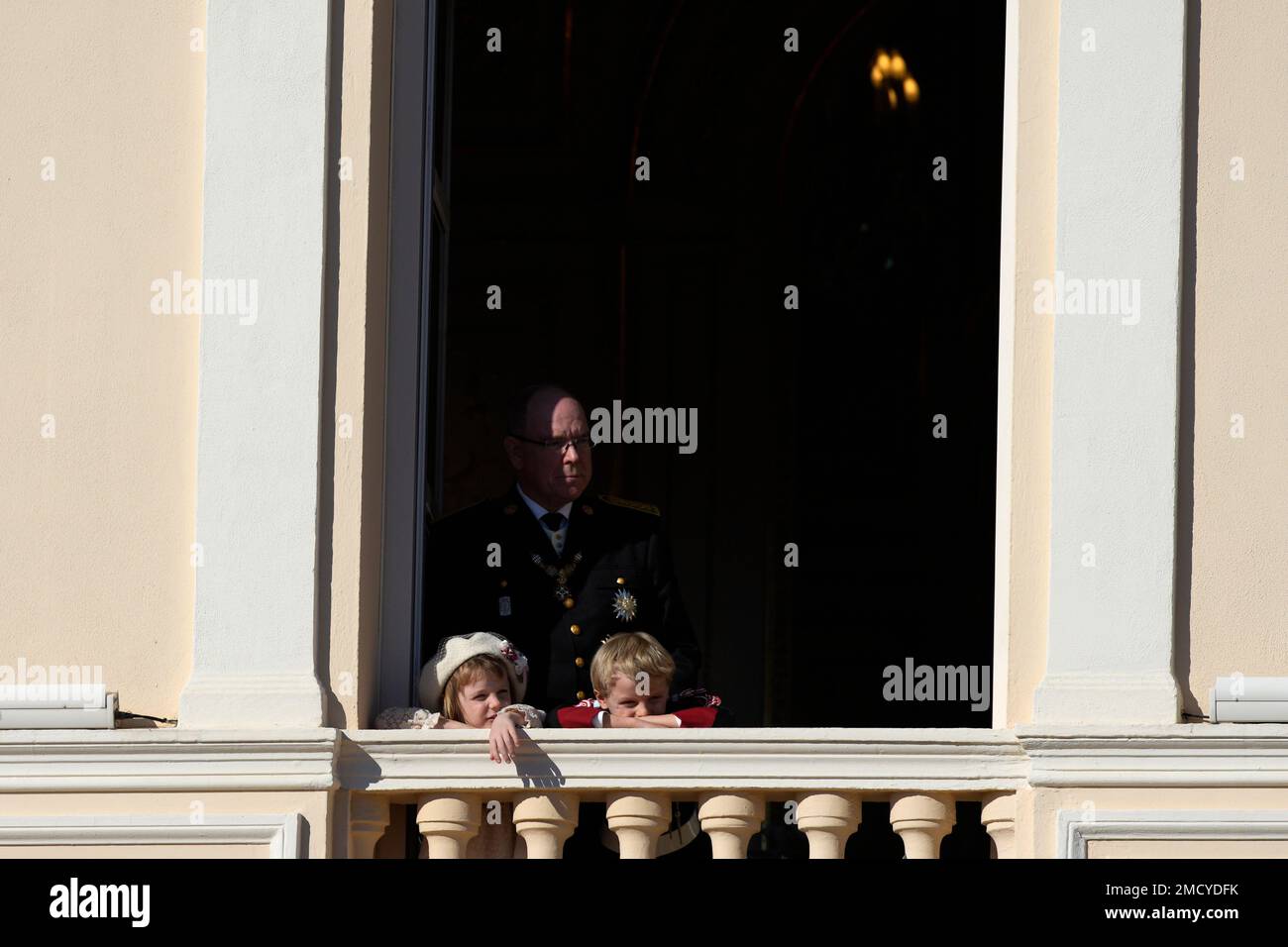 Prince Albert II of Monaco stands with his children Prince Jacques and ...