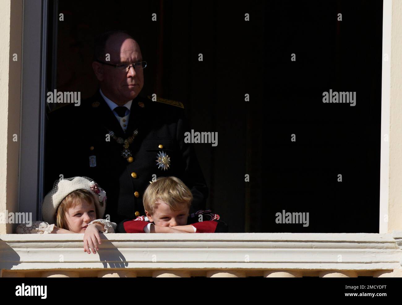 Prince Albert II of Monaco stands with his children Prince Jacques and ...