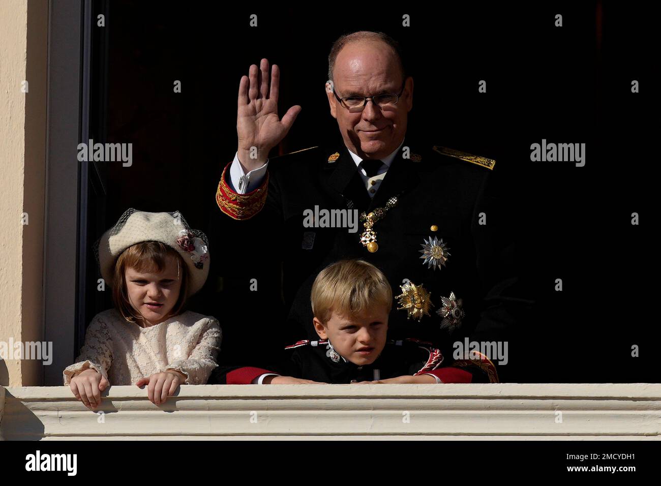 Prince Albert II of Monaco waves by his children Prince Jacques and ...