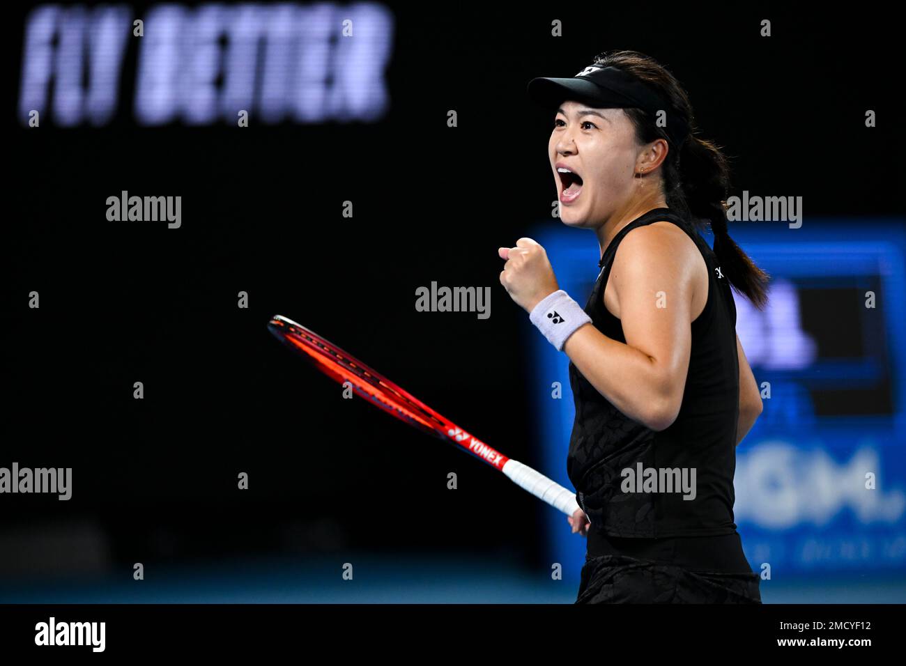 Lin Zhu of China reacts during her 4th round match against Victoria ...