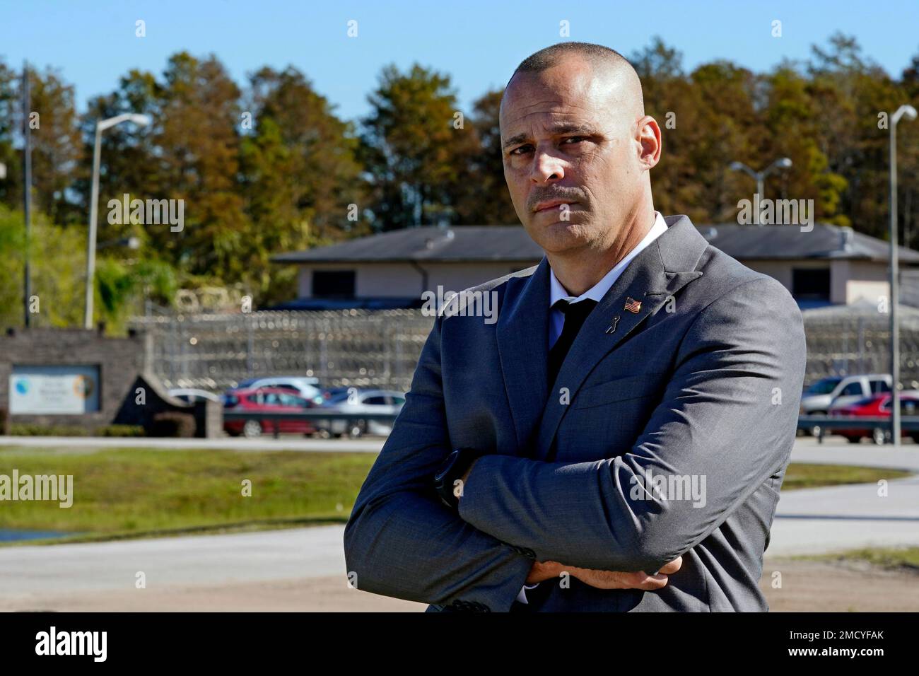 Mark Caruso, a former sergeant with Florida corrections, stands outside ...