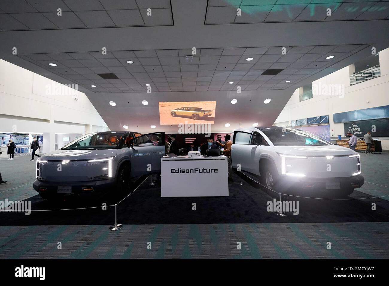 EdisonFuture displays its EVs, the EF1-V van, at right, and the EF1-T ...