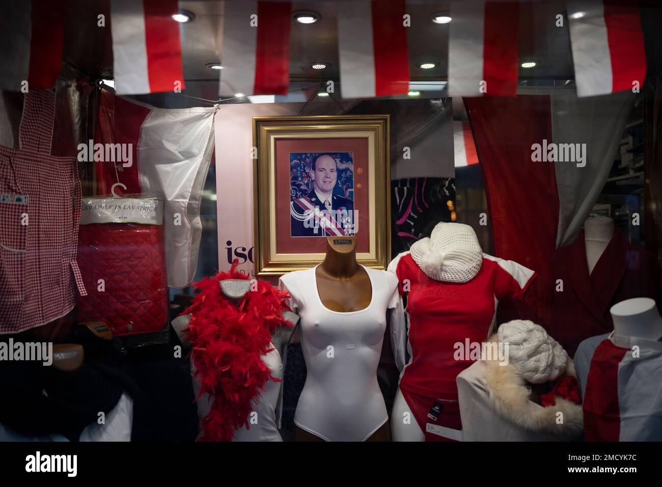 A portrait of Prince Albert of Monaco is displayed in a shop window in ...