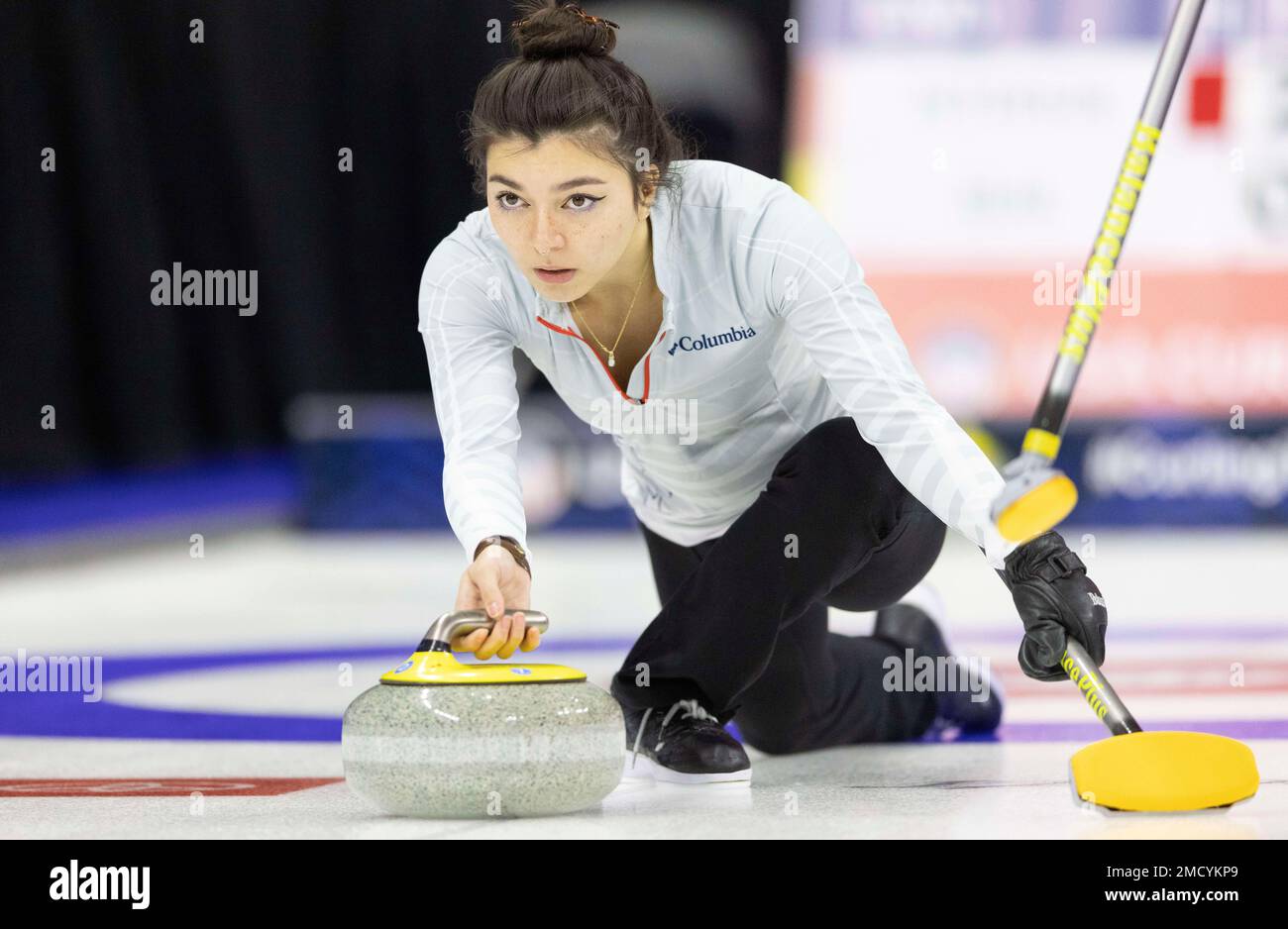 Team Bear's Annmarie Dubberstein throws the rock while competing ...
