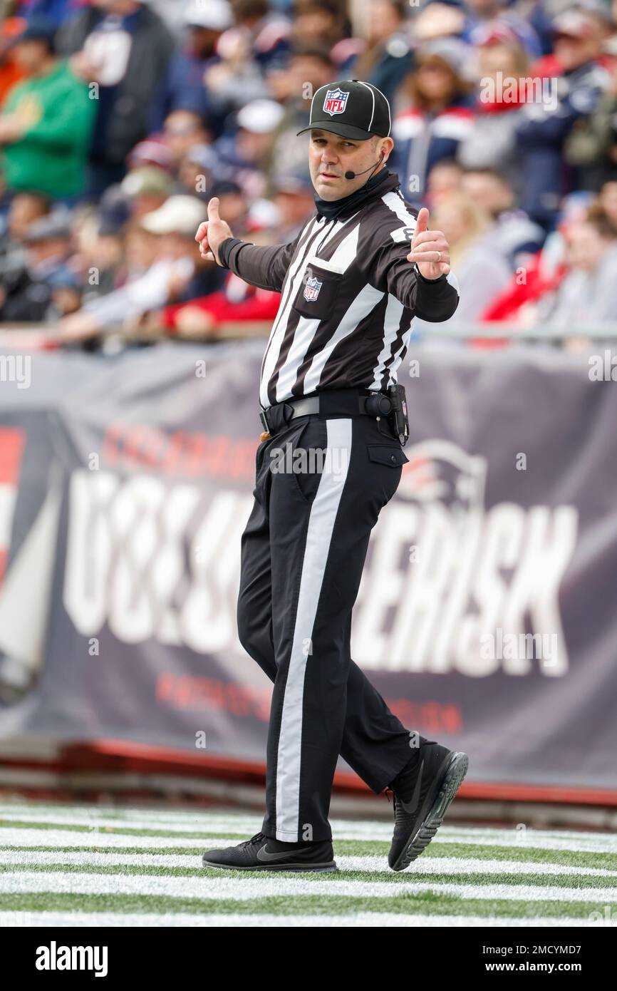 NFL back judge Brad Freeman (88) officiates during the first half of an ...