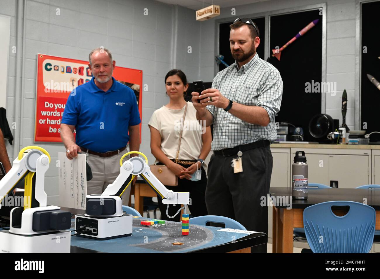 Sam Walters, CenterPoint Energy director of engineering, captures the ...