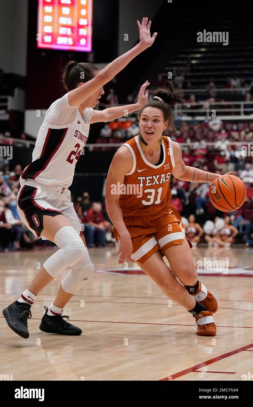 Texas guard Audrey Warren (31) is defended by Stanford guard Lacie Hull ...