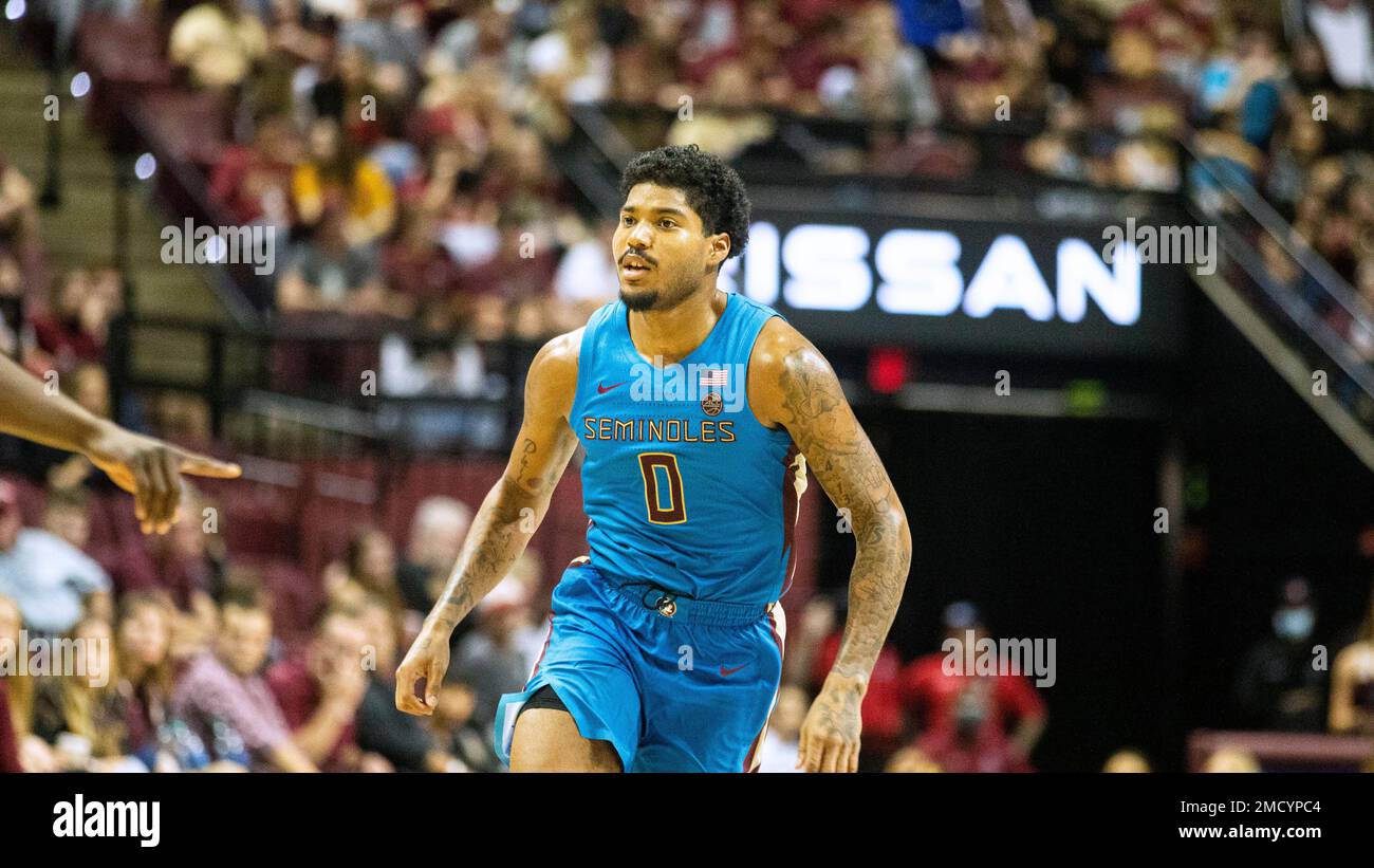 Florida State guard Rayquan Evans (0) brings the ball up court against ...