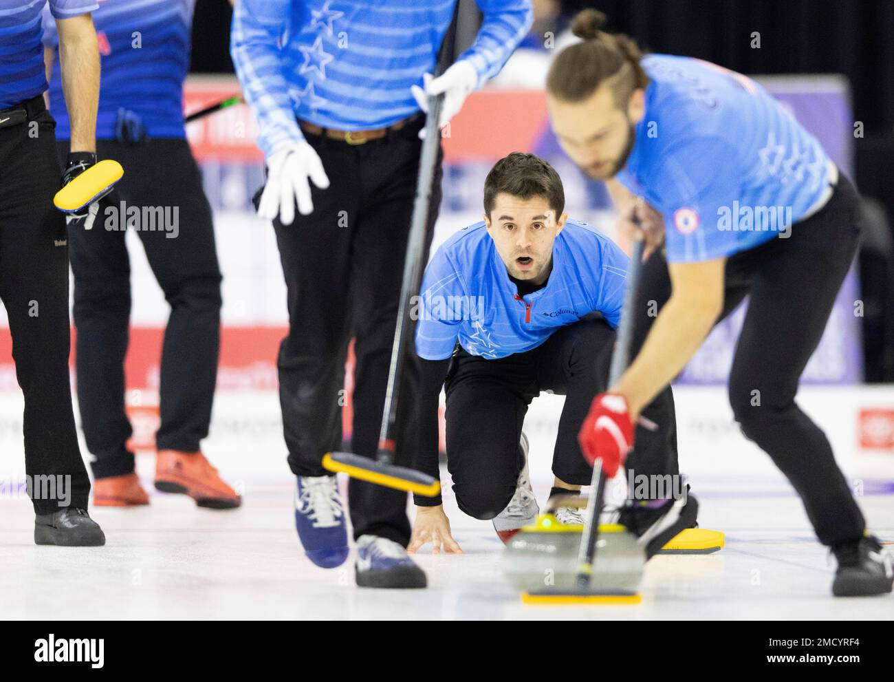 Team Dunnam's Scott Dunnam, center, watches as Andy Dunnam, left, and ...