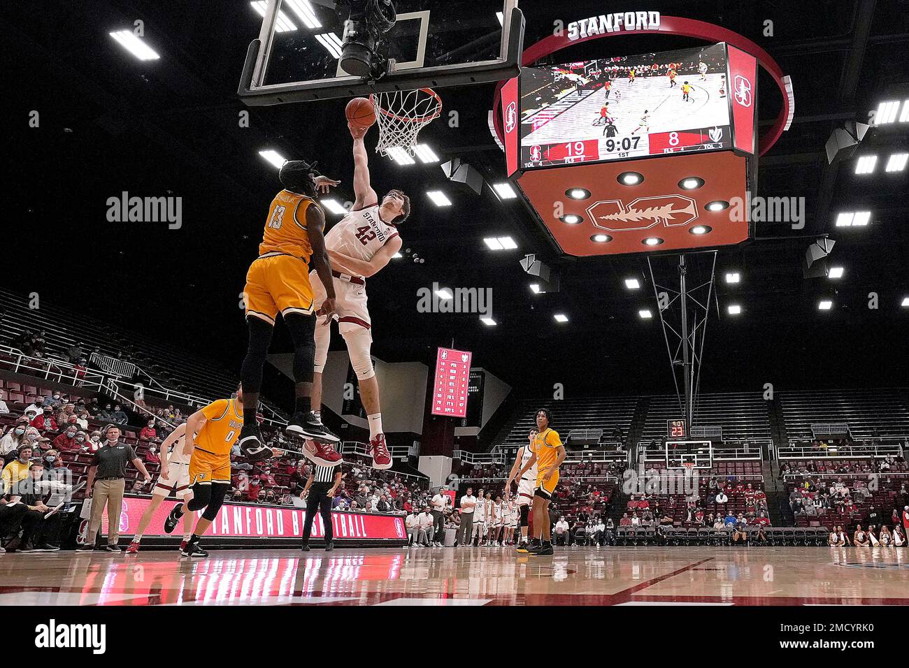 Stanford forward Maxime Raynaud (42) dunks against Valparaiso guard ...