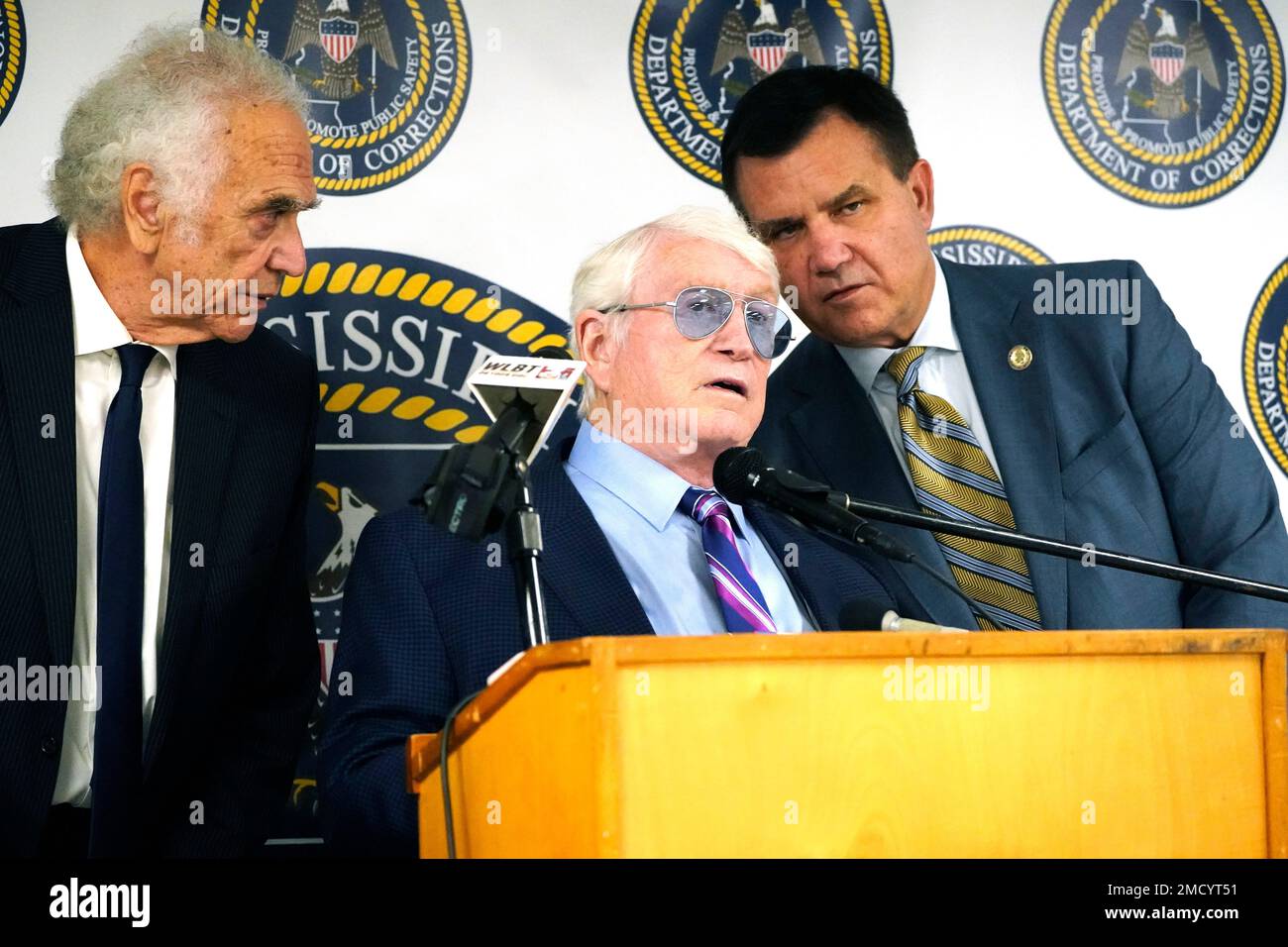 Mississippi Department of Corrections Commissioner Burl Cain, center ...