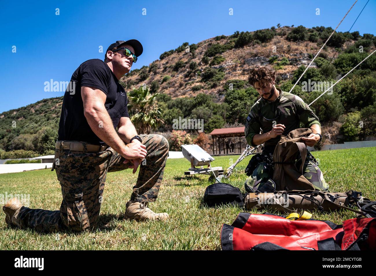 U.S. Navy (Left) Petty Officer First Class Michael Francom, a Special ...
