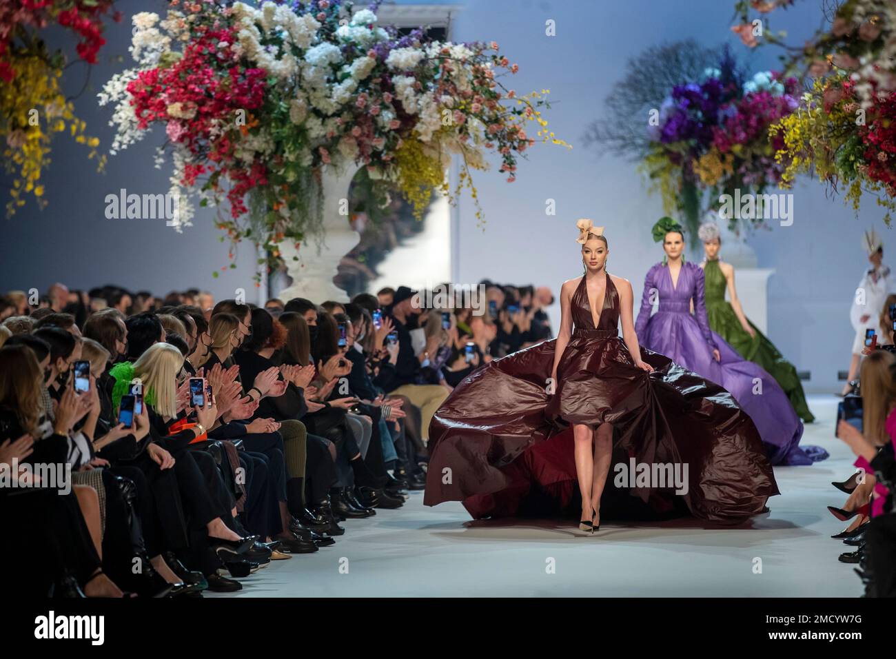 Models present creations from the Lithuanian designer Juozas ...