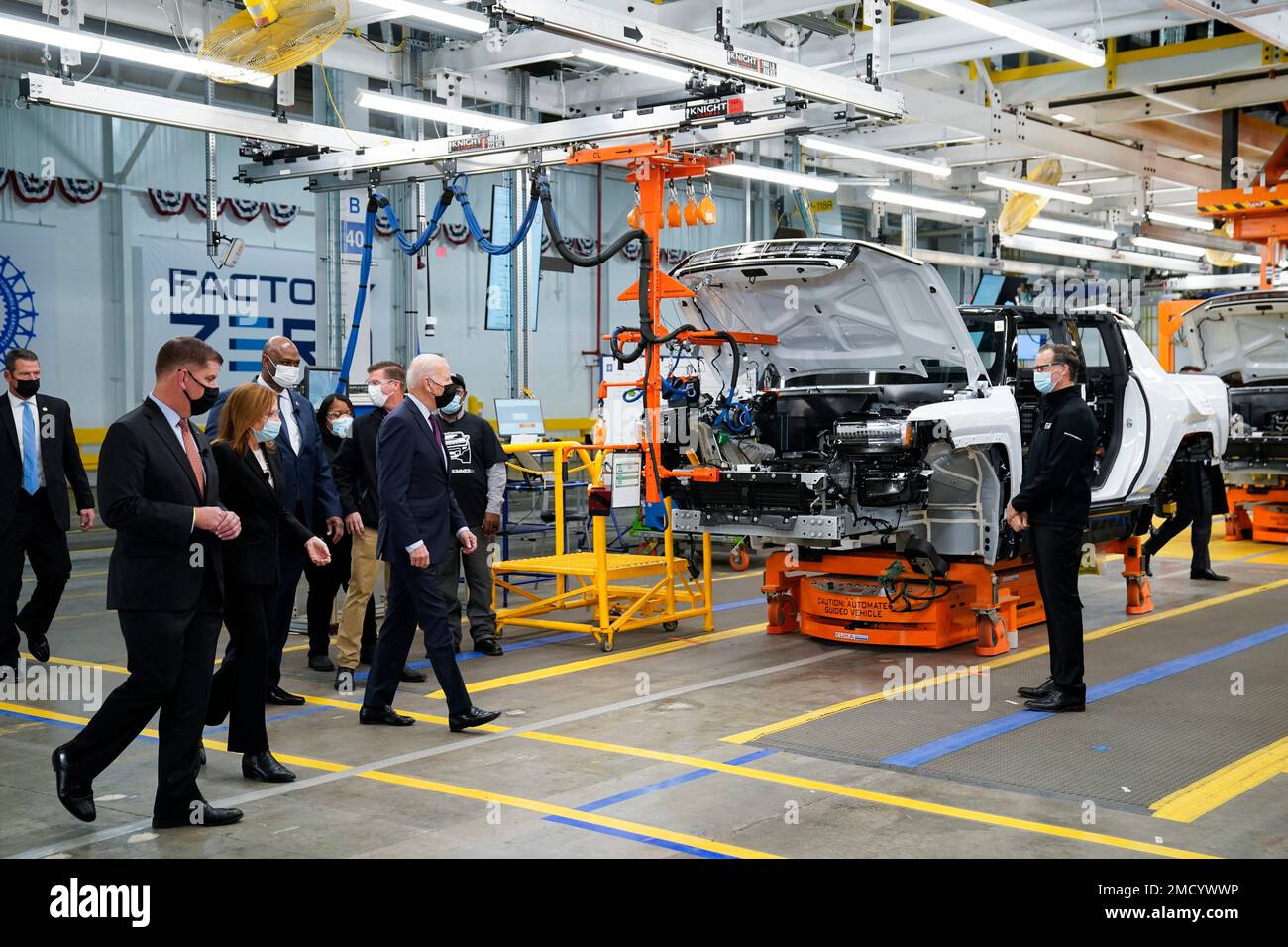 President Joe Biden participates in a tour of the General Motors ...