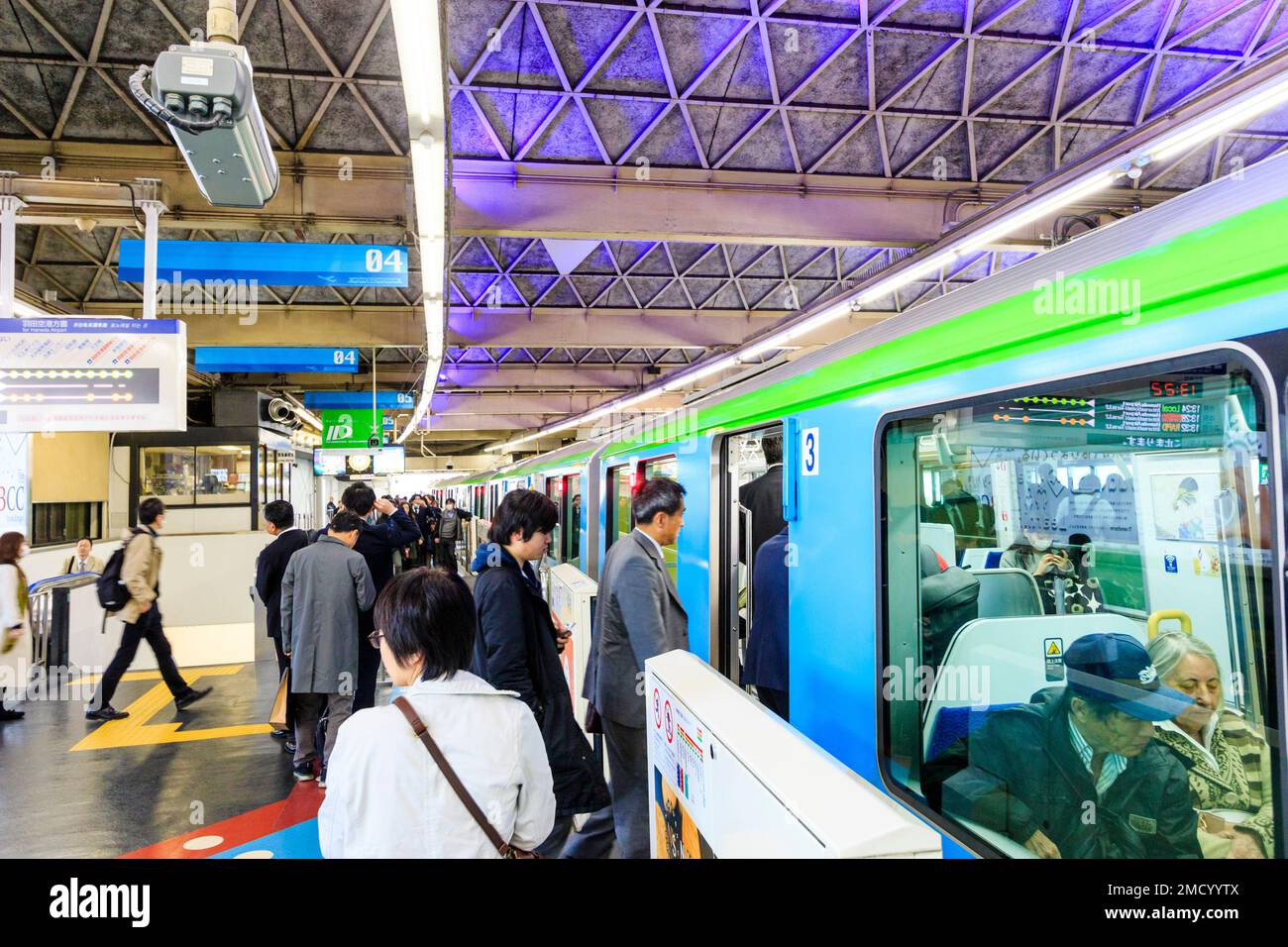 Tokyo Hamamatsucho station interior. People boarding Tokyo monorail ...