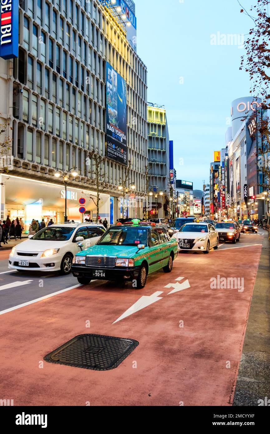 Tokyo, Shibuya. Evening blue hour view along Jingu-Mae dori shopping ...