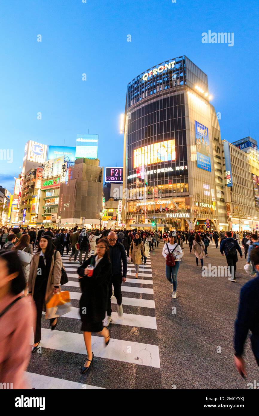 Tokyo. Shibuya. The famous landmark busy scramble crossing, with people ...