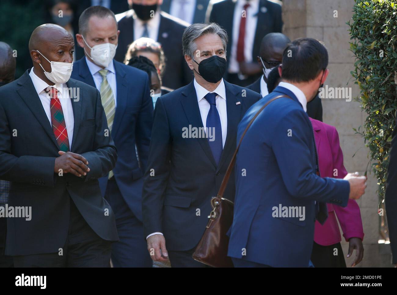 Secretary of State Antony Blinken, center, arrives to lay a wreath ...