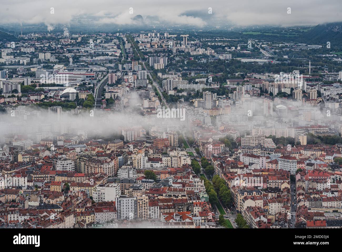 Grenoble cityscape, aerial view of Grenoble city with clouds and ...