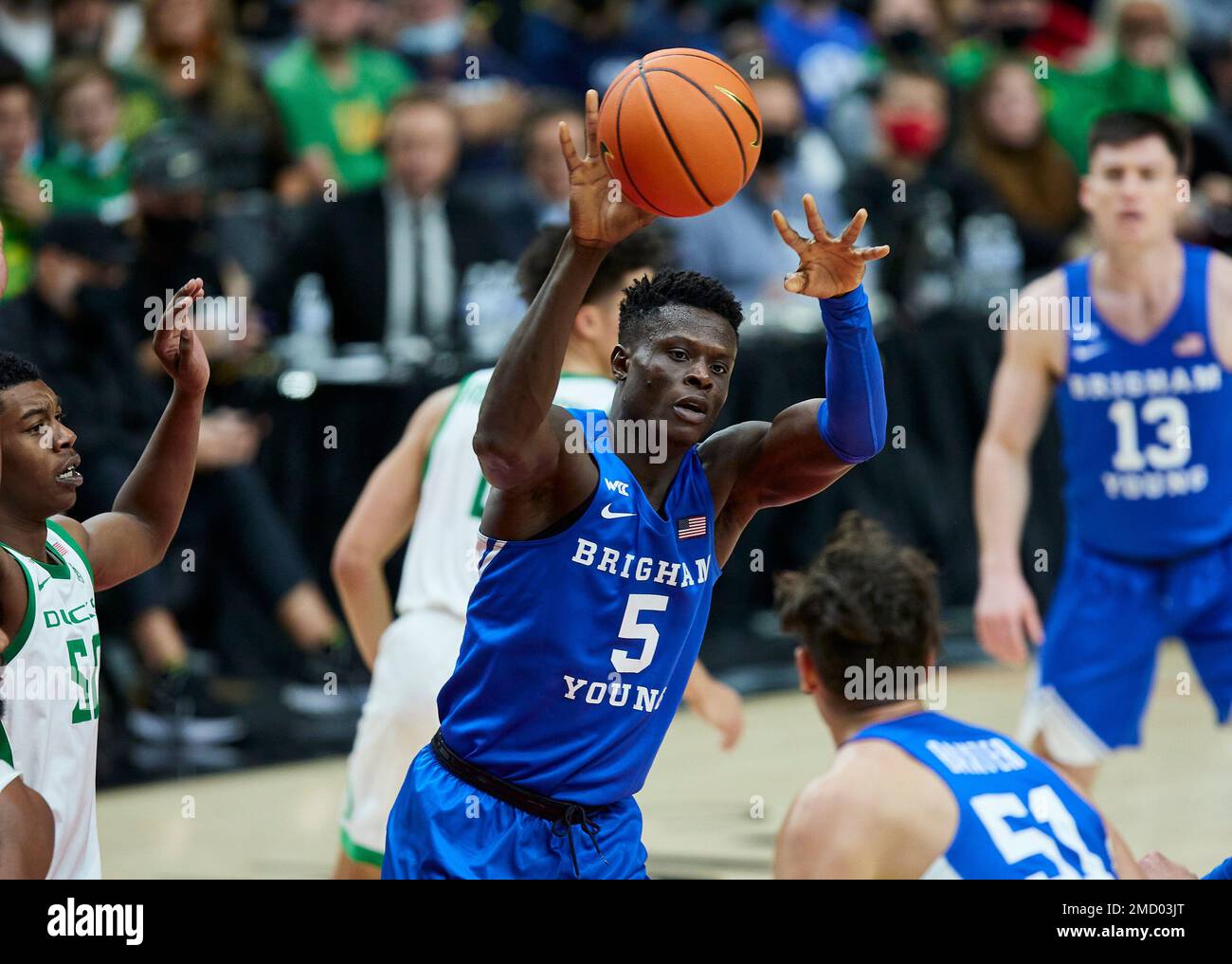 BYU forward Gideon George passes the ball during the second half of an ...