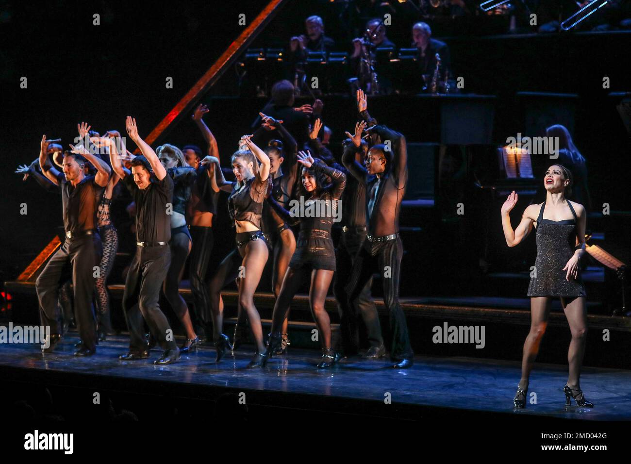 The cast of "Chicago" performs during the 25th anniversary of the ...